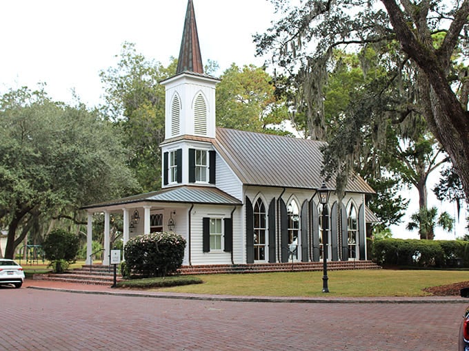 This charming white chapel in Bluffton stands peacefully among Spanish moss, offering you a beautiful glimpse of South Carolina's history.