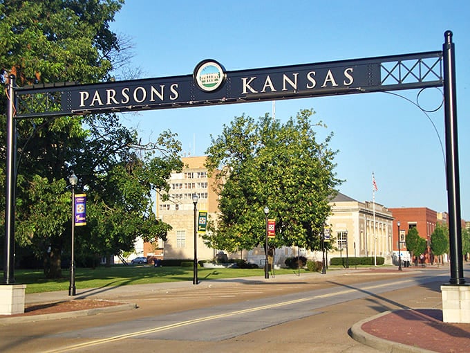 The "Parsons, Kansas" gateway marks the entrance to a community that balances historic charm with modern small-town living.