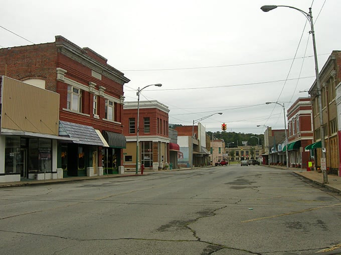 Poteau's quiet main street whispers stories of Oklahoma's past, with brick buildings standing proud like sentinels of simpler times.