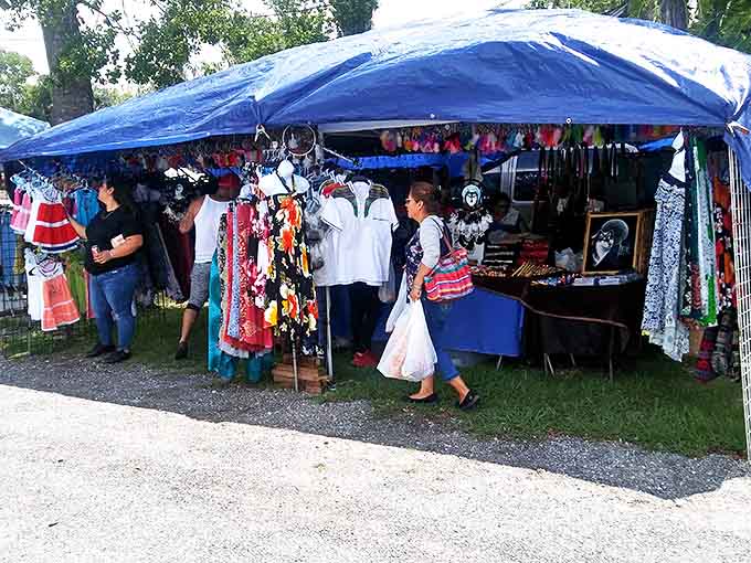 Under shady tents, vendors display everything from clothing to crafts in this outdoor shopping paradise.