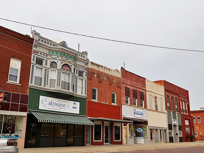 West Point's colorful main street buildings feature decorative facades and awnings, creating the perfect backdrop for small-town Nebraska adventures.