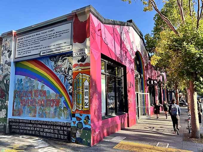 That hot pink exterior with rainbow murals isn't just eye-catching, it's practically demanding you come inside and explore.