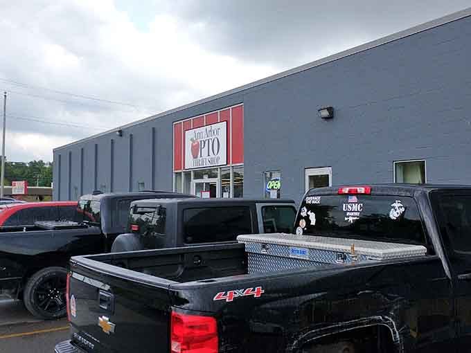 That gray warehouse exterior might look unassuming, but inside lies a treasure trove worth exploring for hours.