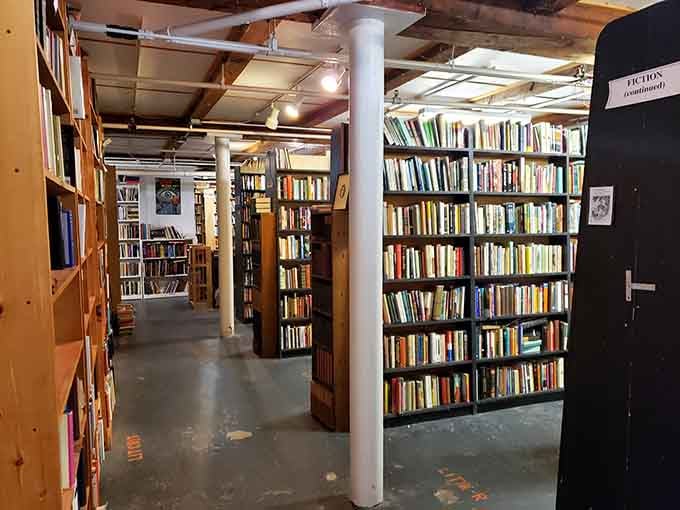 Rows of wooden shelves stretch into the distance like a bibliophile's fever dream come true.