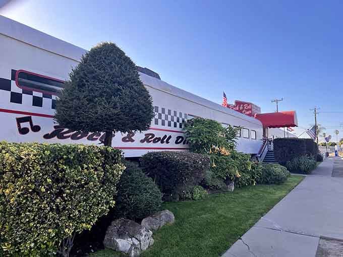 The checkered racing flags and chrome details prove that sometimes the best destinations are worth slowing down for.