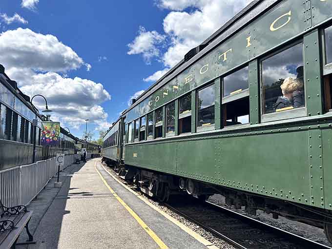 Those vintage green coaches aren't just for show; they're your ticket to a slower, sweeter way of traveling.