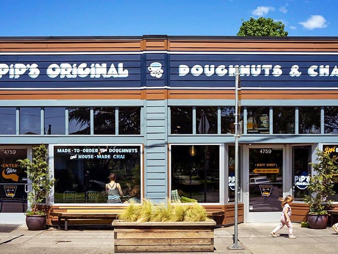 That blue and copper storefront isn't just charming, it's basically sending out a beacon for doughnut lovers everywhere.