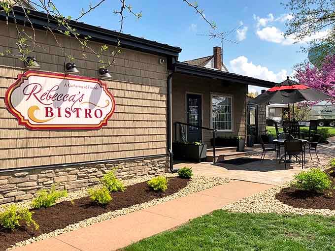 That elegant sign out front isn't just decoration; it's a promise of the culinary magic waiting inside this charming bistro.