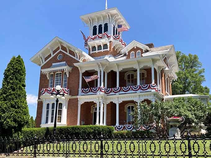 The ornate ironwork fence alone probably cost more than most people's entire homes back in the day.