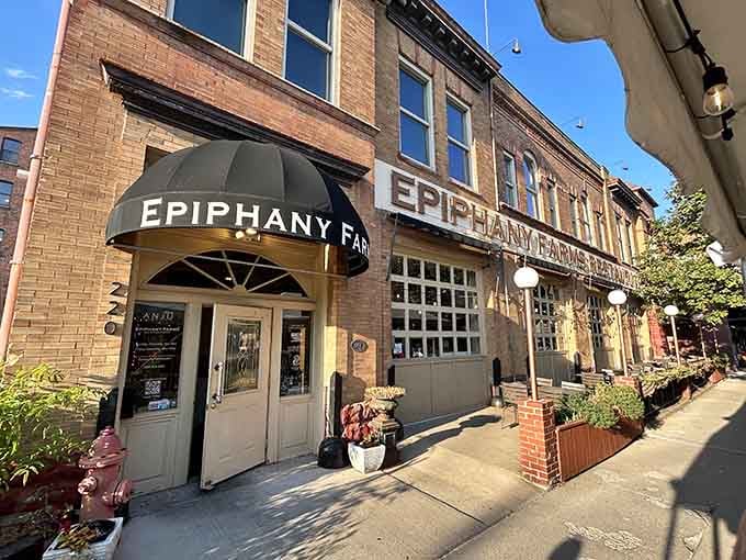 That charming storefront with the curved awning practically whispers "come discover something special" to anyone walking by downtown Bloomington.