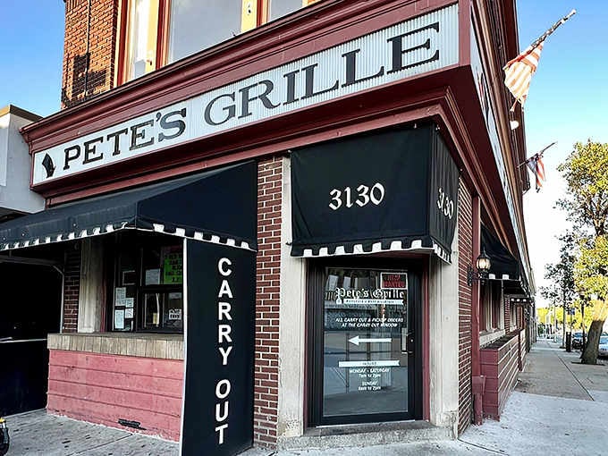 That classic corner diner exterior promising everything good about breakfast, right there on Greenmount Avenue in Baltimore.