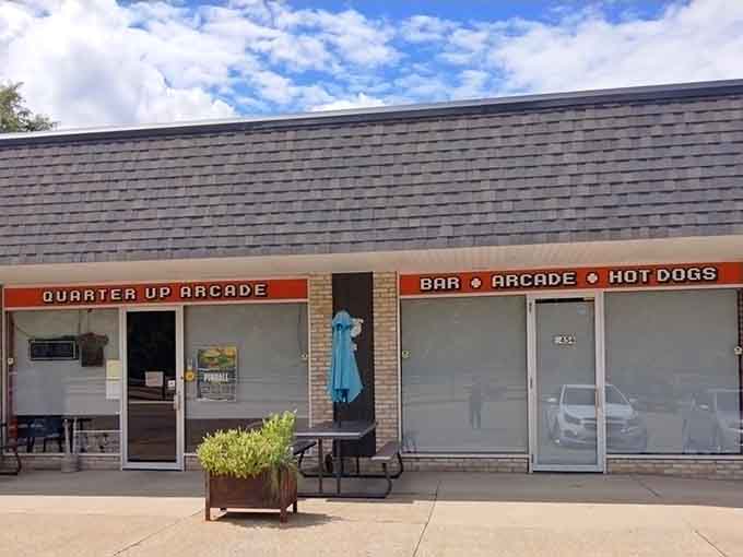 That unassuming storefront hides a portal to 1985, where quarters were currency and high scores meant everything.