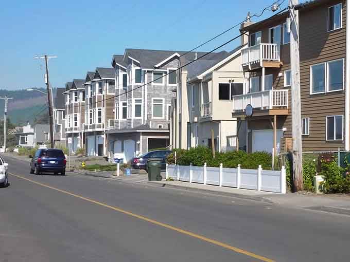 Modern beach houses line quiet streets where the biggest traffic jam involves waiting for a dog to cross.
