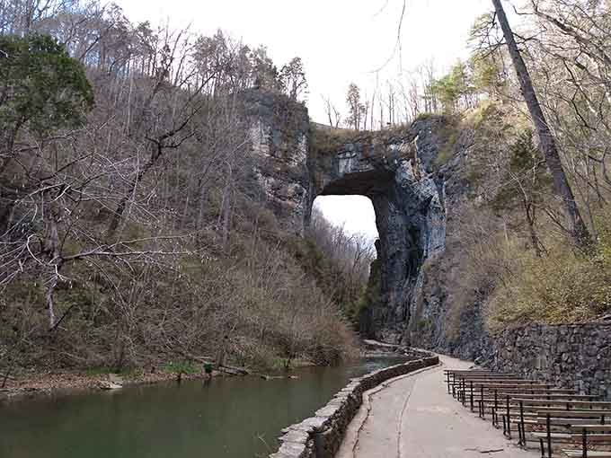 Experience the breathtaking beauty of this towering limestone arch, where tranquil waters and scenic trails meet in a historic canyon.