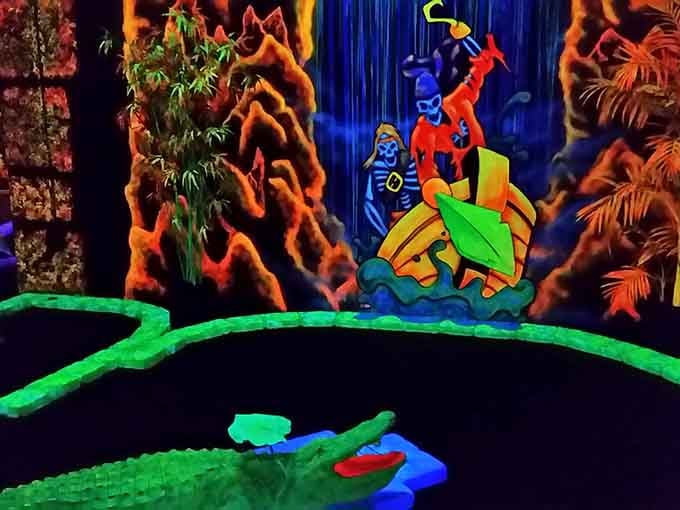 That alligator has seen things, neon things, and he's judging your putting form with glowing red eyes.