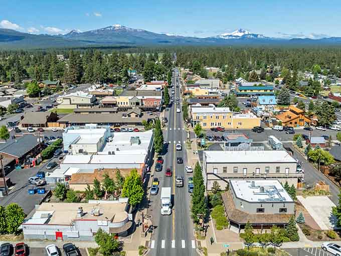 Those mountain peaks aren't just scenery, they're the three sisters who gave this town its name and its soul.