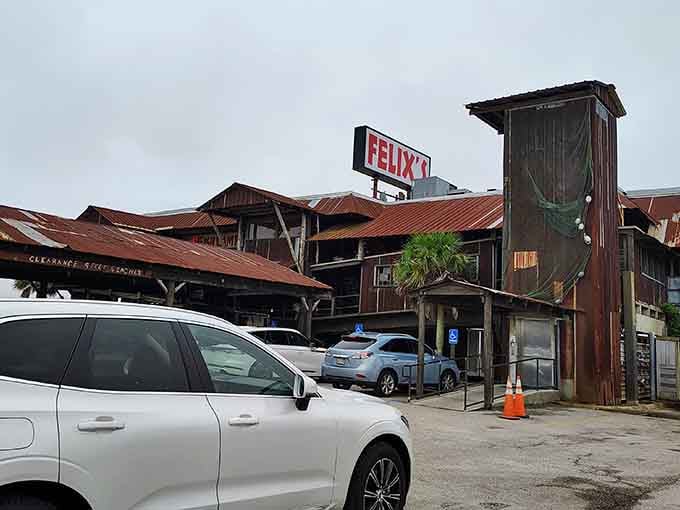 Felix's weathered exterior embodies authentic Gulf Coast charm &ndash; where rustic architecture promises seafood treasures within.