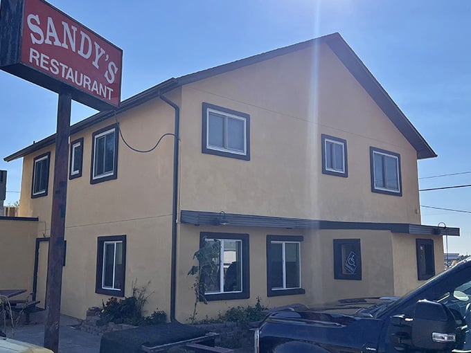Don't let the modest appearance fool you – behind that simple sign and beige exterior lies a Colorado Springs institution where breakfast dreams come true.