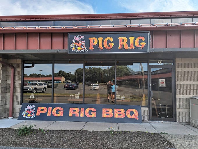 The unassuming storefront of Pig Rig BBQ welcomes hungry visitors with its bold signage and no-frills approach to authentic barbecue.
