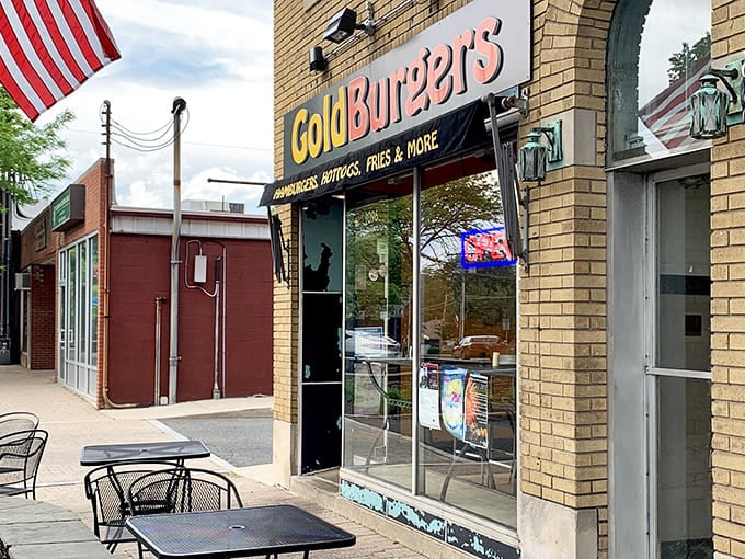 The golden letters against brick say it all: unpretentious, straightforward, and promising burger bliss that keeps locals coming back.
