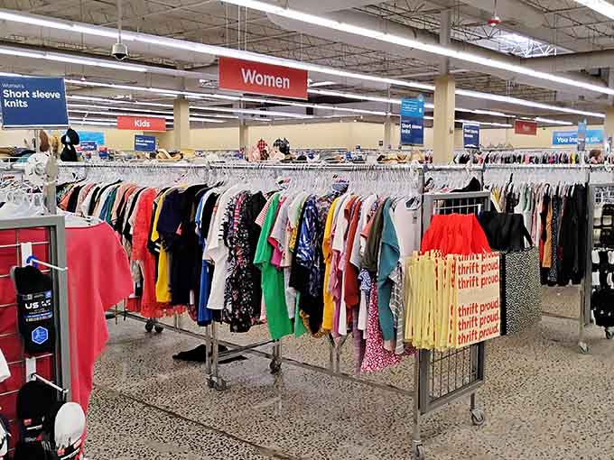 Racks upon racks of women's clothing stretch toward the horizon, creating a rainbow of fabrics waiting to be discovered.