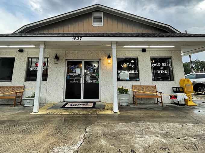 The unassuming exterior of this coastal gem belies the seafood treasures waiting inside, including those legendary hush puppies.
