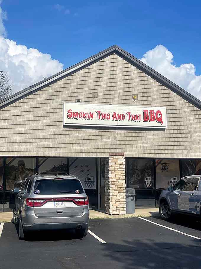 The unassuming facade of barbecue brilliance stands proudly against Kentucky's blue sky, promising smoky treasures within that will make your taste buds dance with joy.