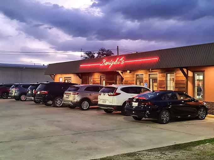 That red neon sign isn't just illuminating the night&mdash;it's a beacon calling hungry souls to Lafayette's temple of Cajun cuisine.