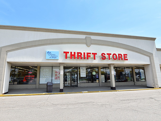 Bold red letters announce "THRIFT STORE" with all the subtlety of your aunt announcing she found designer jeans at 90% off.