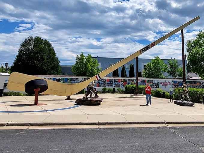 The World's Largest Hockey Stick stretches toward the sky, a wooden behemoth that makes you wonder if Paul Bunyan moonlights as a hockey player.