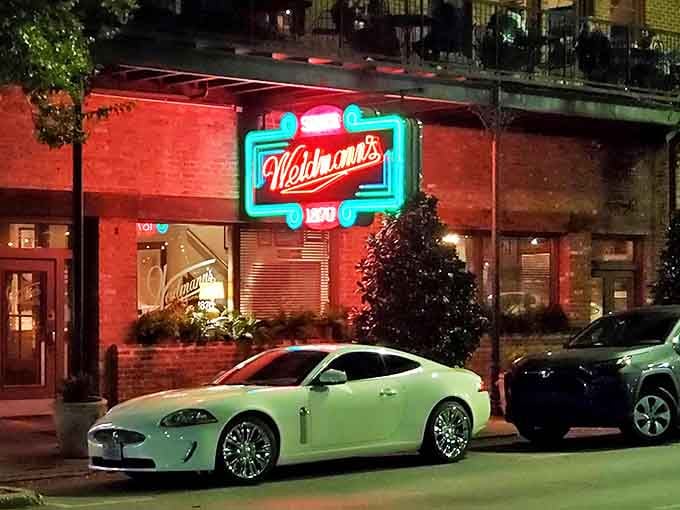 Even luxury cars know where to park for dinner in Meridian. This brick facade has welcomed generations of hungry Mississippians since before automobiles existed.