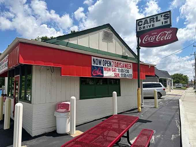 That vintage Coca-Cola sign isn't just decoration, it's a beacon calling hungry travelers home to simpler times.
