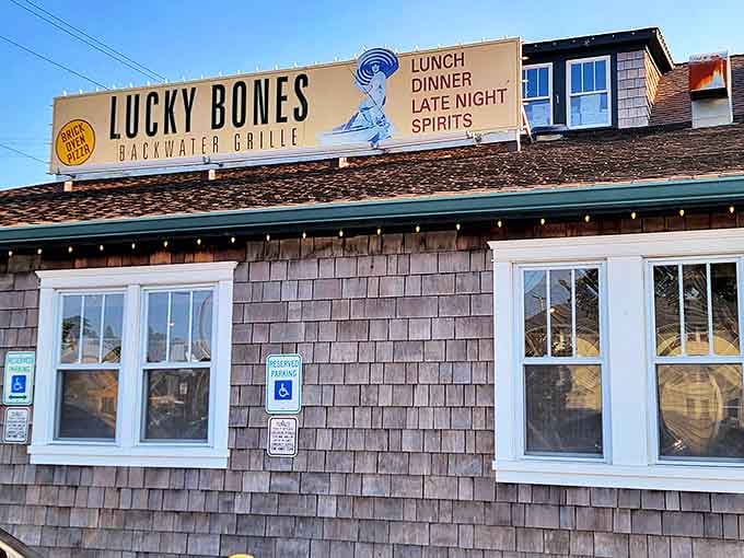 The weathered shingle siding and green trim of Lucky Bones whispers "come on in" like an old friend who knows all the best fishing spots in Cape May.
