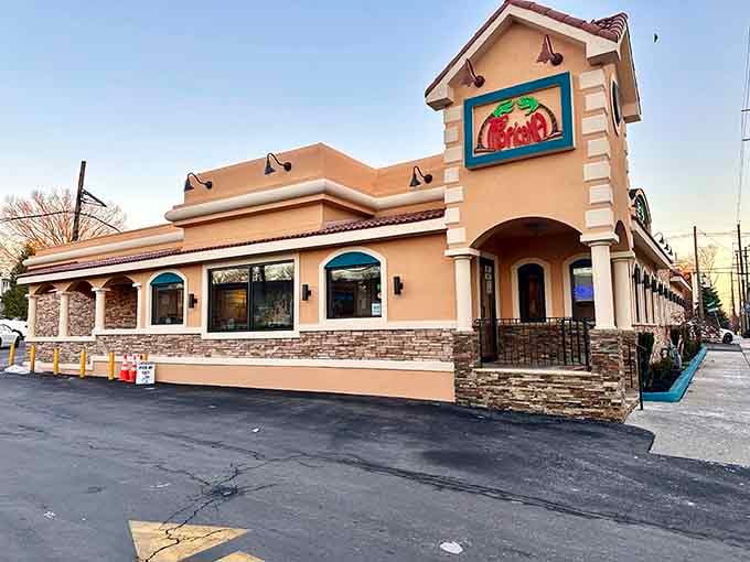 That peachy exterior with stone accents isn't your typical diner look, and that's exactly the point here.