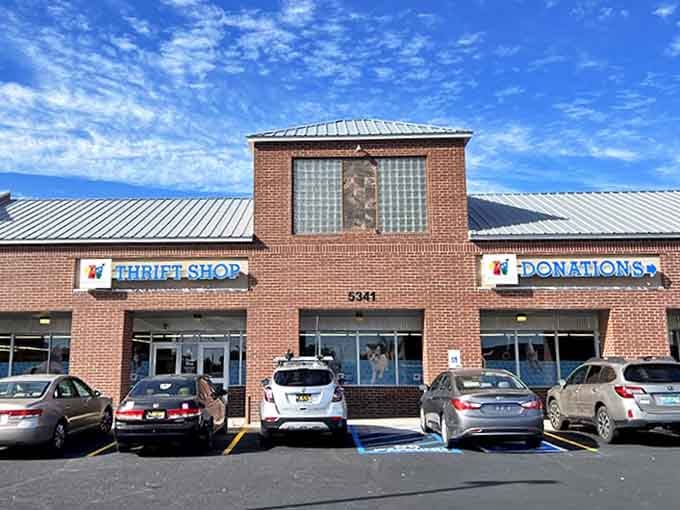 The brick facade of bargain paradise! Under that brilliant New Mexico sky, treasures await behind those unassuming doors where both your wallet and furry friends win.