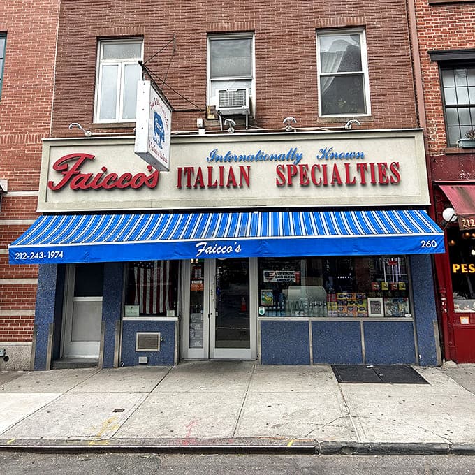 The iconic red lettering of Faicco's against the brick facade isn't just a sign&mdash;it's a beacon for sandwich pilgrims seeking Italian-American nirvana on Bleecker Street.