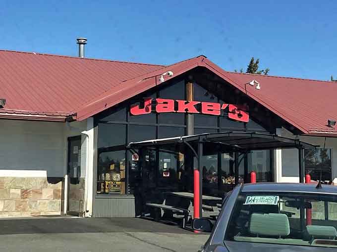Large windows invite natural light while the covered patio promises al fresco dining when Oregon weather cooperates beautifully.