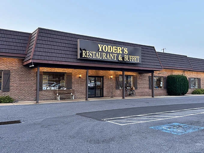 Morning light catches Yoder's brick fa&ccedil;ade, where locals and tourists alike gather for that legendary prime rib. The bench outside is for catching your breath after multiple buffet trips.