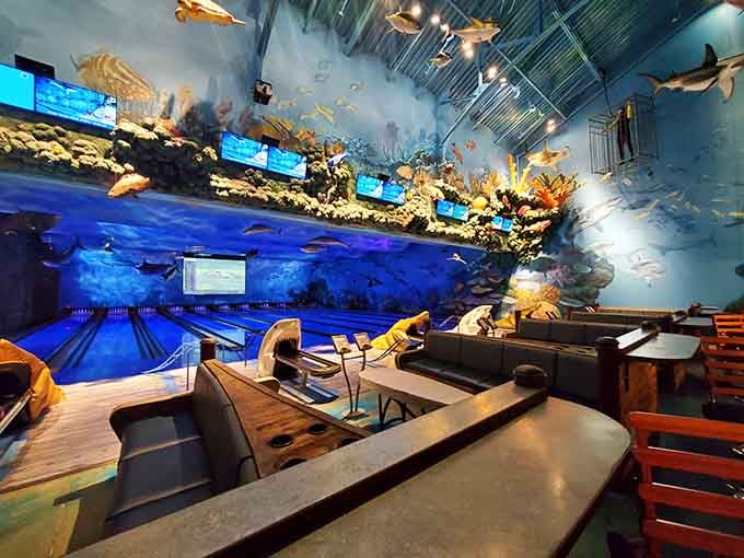 When bowling lanes meet ocean depths, you get this spectacular underwater wonderland that defies all restaurant logic.