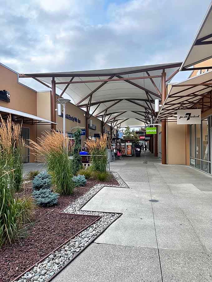 Nature meets retail therapy with these thoughtfully designed walkways. Like a runway model with an umbrella, these canopies keep shoppers stylishly dry while they hunt for bargains.