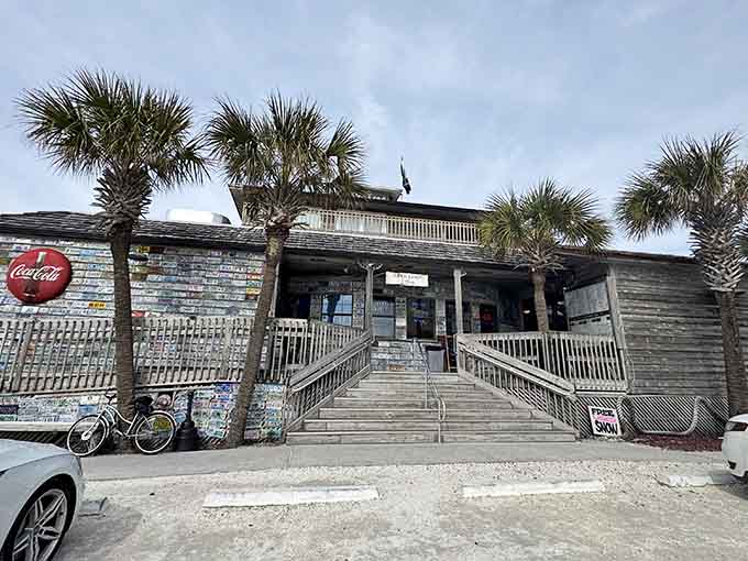 That weathered wood and those palm trees aren't just decoration, they're your first clue you've arrived somewhere special.