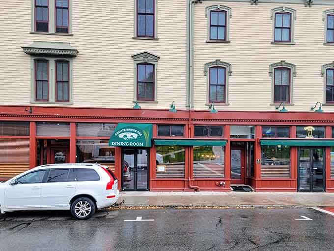 That yellow building with the red storefront isn't just charming architecture, it's your gateway to steak tip paradise.