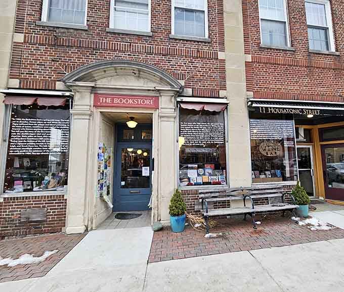 That classic brick facade and blue door are calling your name like a siren song for book lovers.
