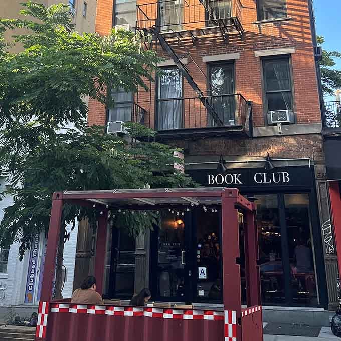 The kind of facade that makes you slow down mid-stride and think, "Wait, did I just find my new favorite place?"