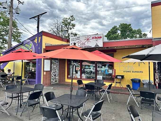 That bright yellow exterior and iconic starburst logo practically glow with 1950s optimism and burger-fueled dreams.