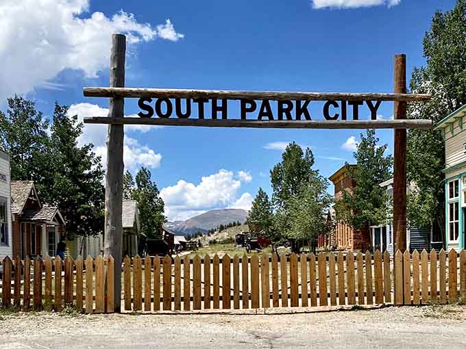 That rustic wooden gateway isn't just an entrance, it's your personal time machine to 1860s Colorado.