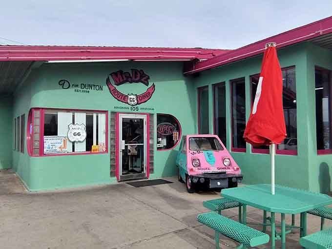 That turquoise and pink color scheme isn't whispering its presence, it's belting out a full Broadway number to passing traffic.