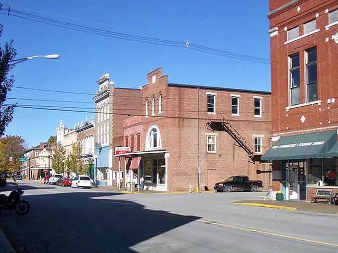 Brick facades and ornate cornices tell stories of utopian dreamers who built something lasting here.