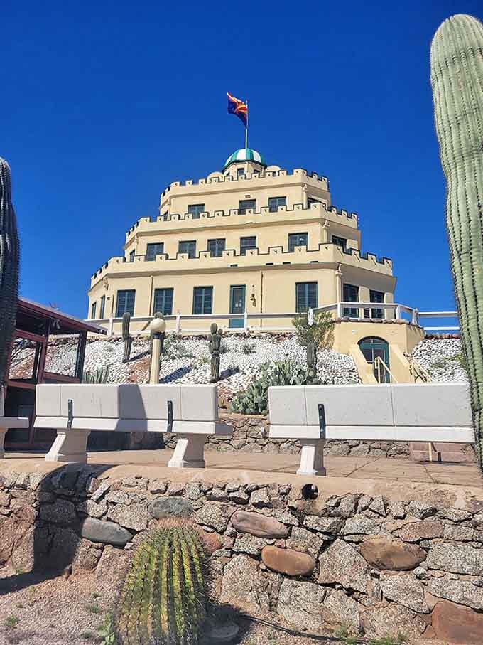 That wedding cake architecture hits different when it's surrounded by an army of saguaros standing at attention.
