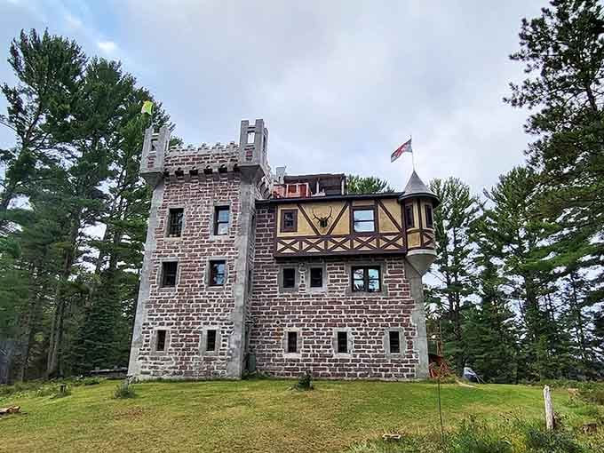 Stone towers rising from Wisconsin soil like someone misplaced a piece of medieval Europe among the pines.